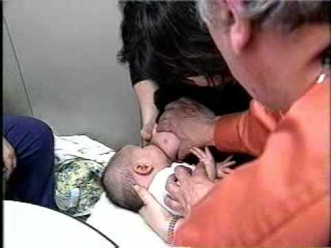 Breastfeeding Breast Compression to Help get the Milk with Dr. Jack Newman