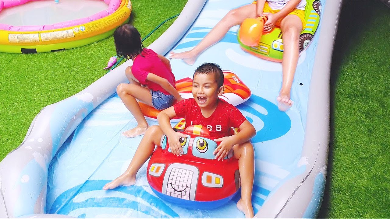 My kids had a fun day playing pool party with inflatable slide - YouTube