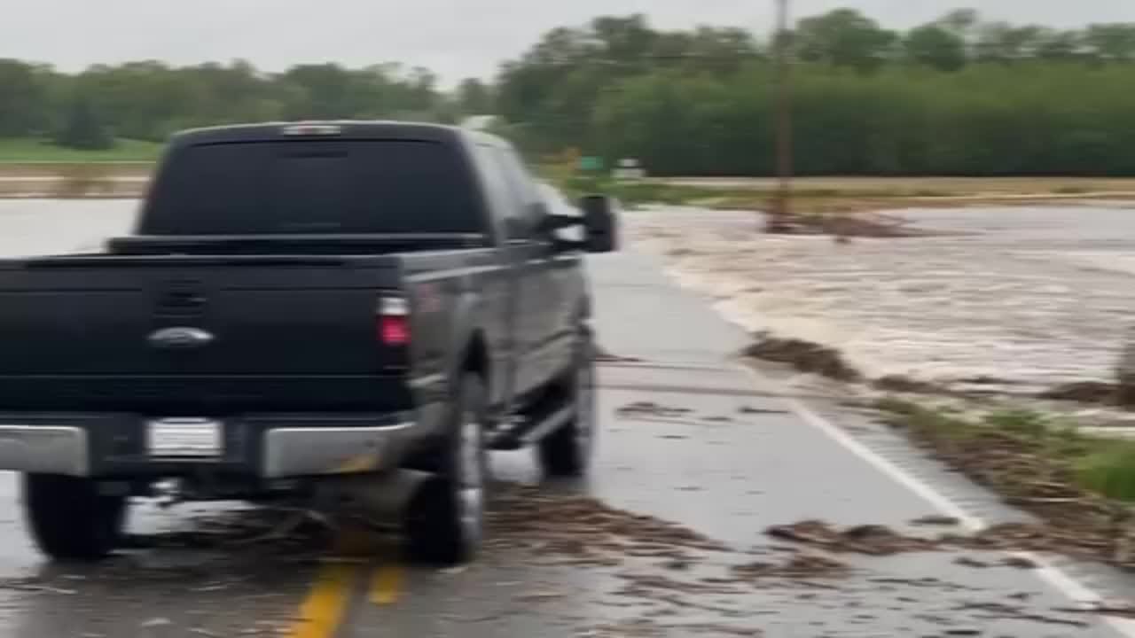 Trucks cross Flash Flooding: Spring River floods over Mo-37 near Reeds ...