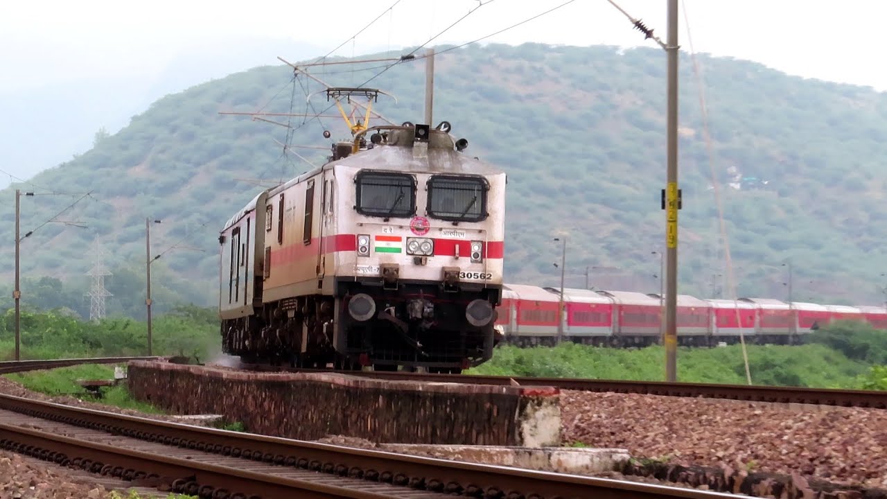 Fast Electric Trains In The Foothills Of Aravalli Mountain Range ...