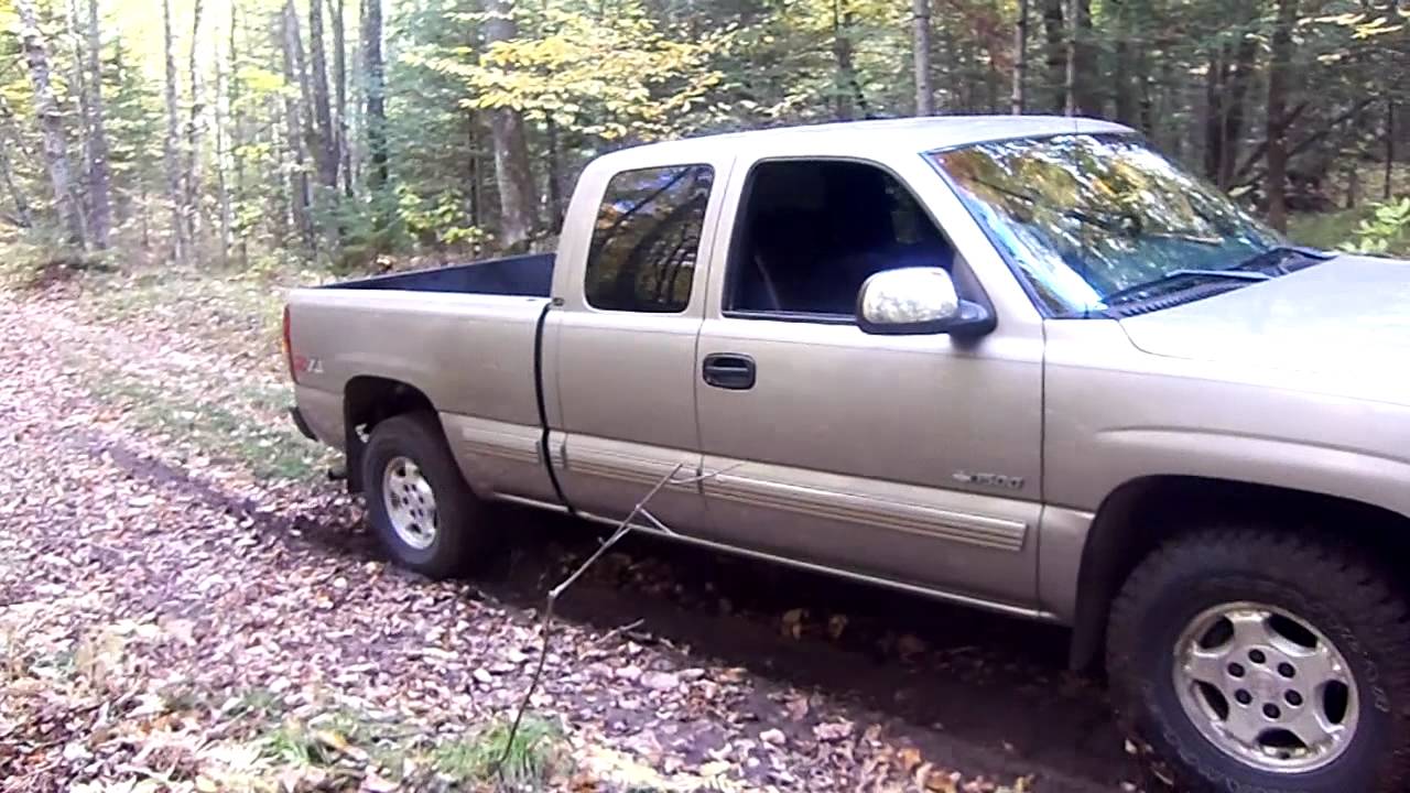 2002 Silverado mudding in 2WD - YouTube