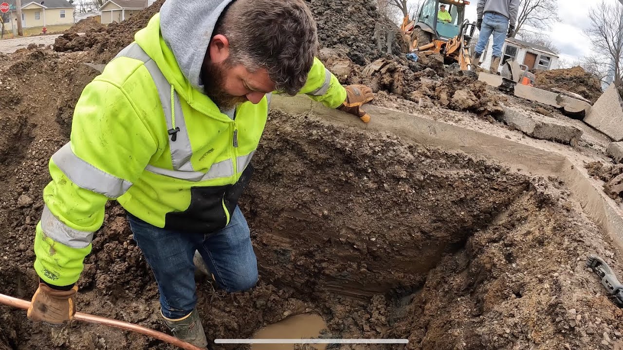 Pulling 3/4 copper under a city street #waterline - YouTube