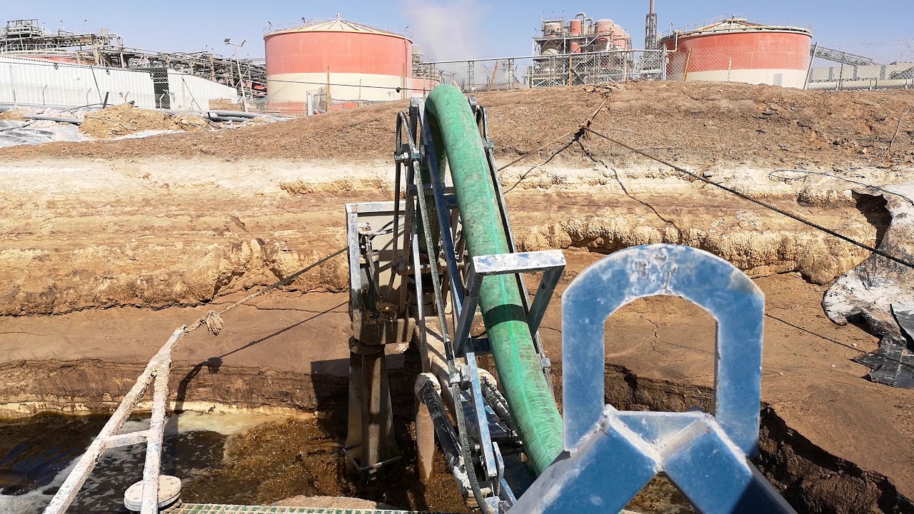 dredging industrial sludge lagoon - robotic barge - The Predator - YouTube