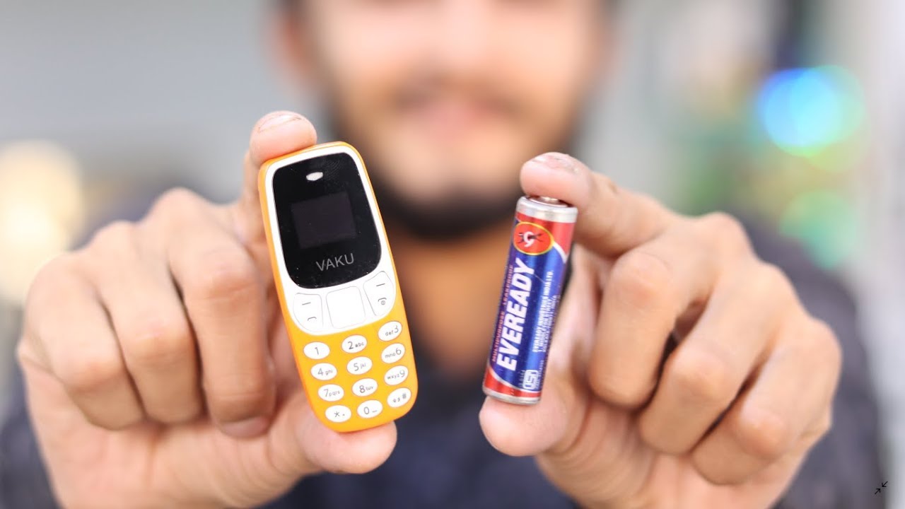 Smallest Dual-Sim Nano Phone with Voice Changer, Alarm, Bluetooth etc ...