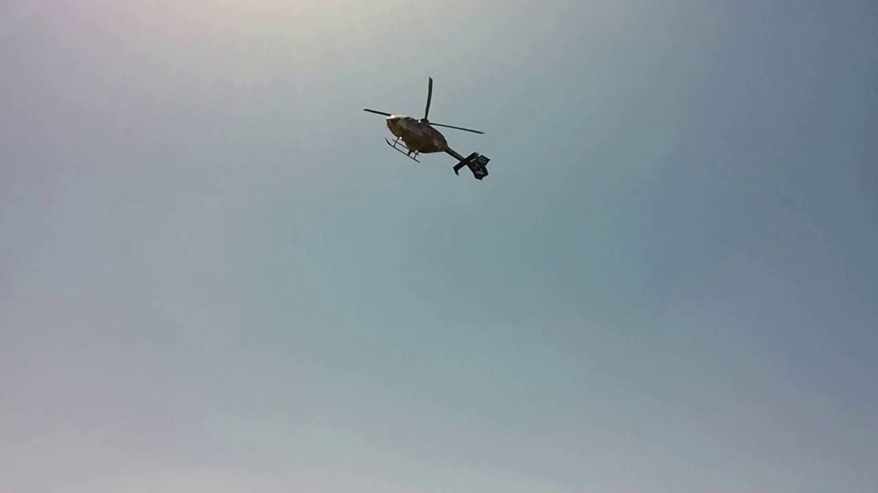 Helicopter Lands on a Football Field - YouTube