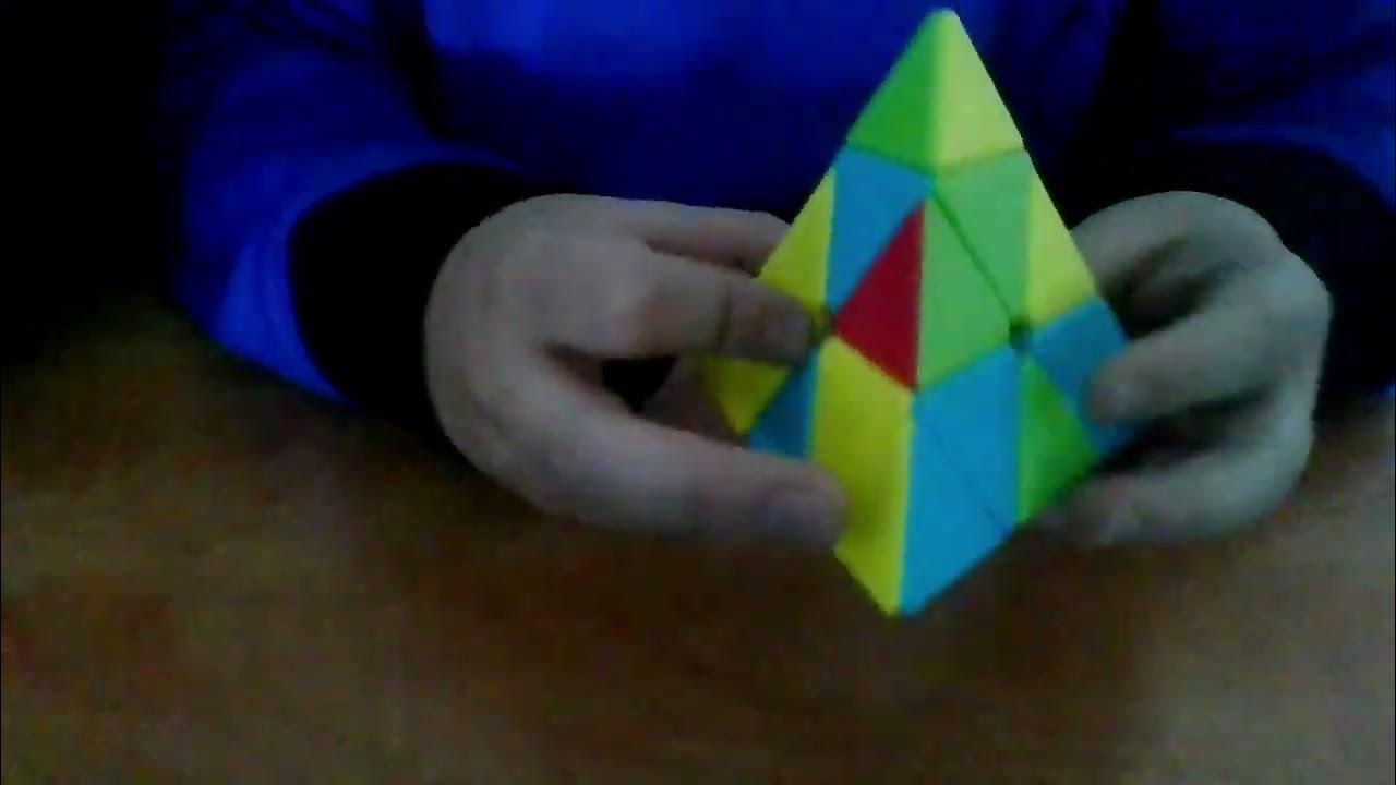Solving Pyraminx Rubix Cube - YouTube