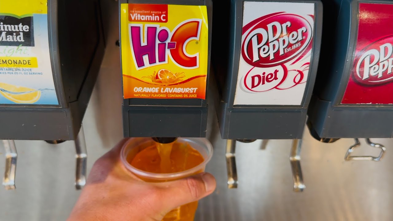 Pouring HI-C Lavaburst Orange Drink Refill at Soda Fountain Machine ...