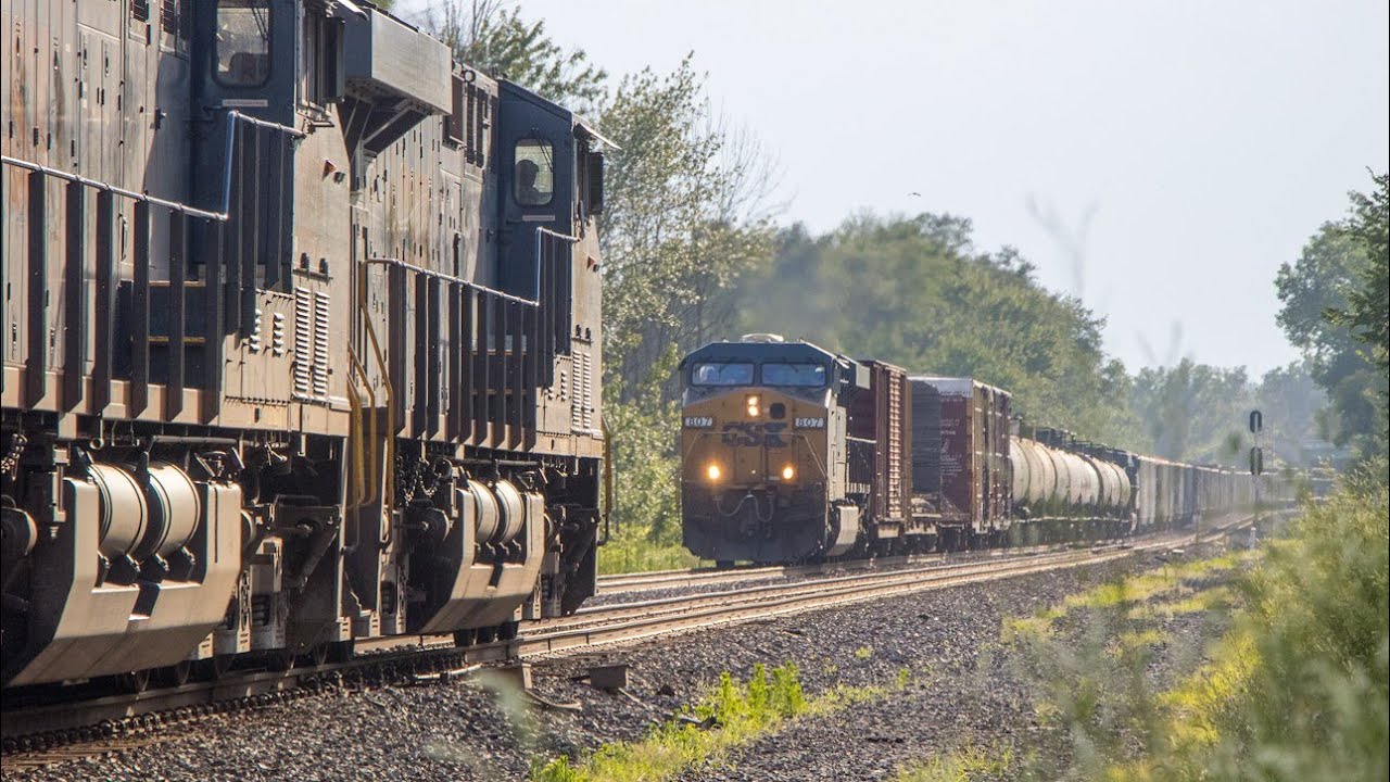 CSX I003-15 meets CSX M634-14 with a DPU at Weedsport NY crossing 7-15 ...