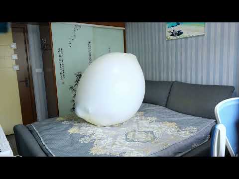 Climb in Balloon - A Man inside a giant human egg?!