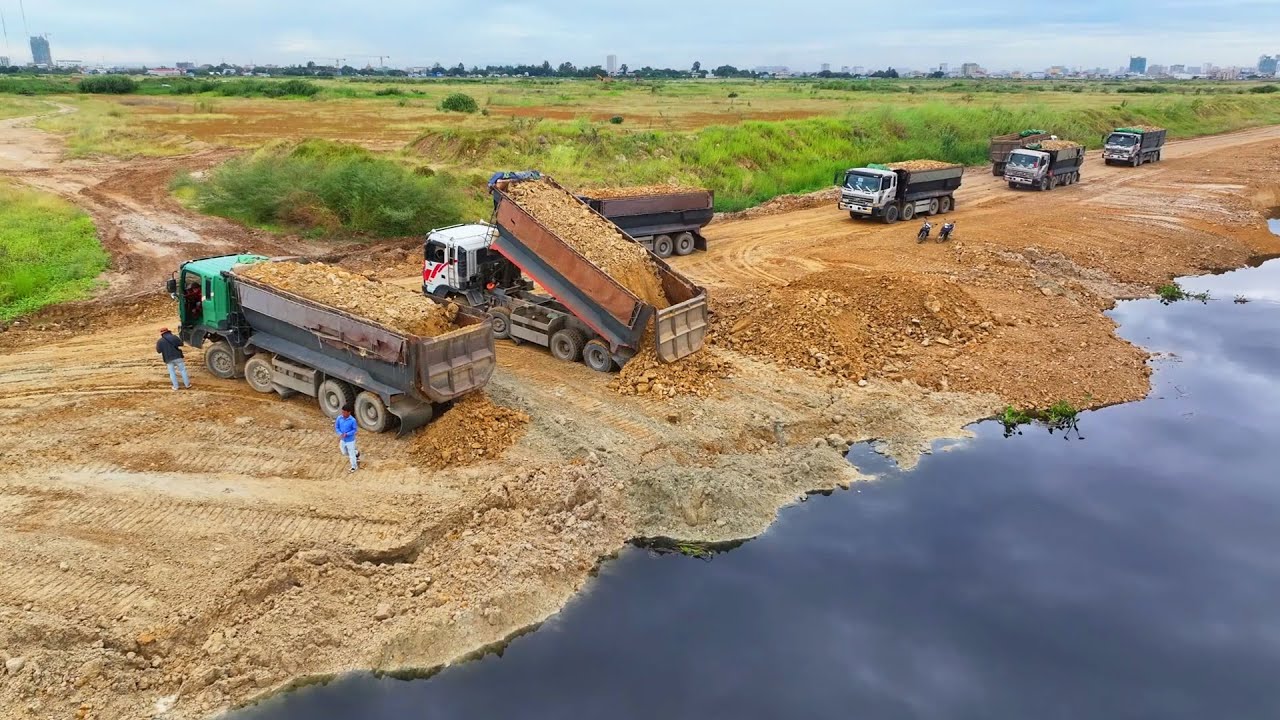 Heavy Equipment Working Filling Lake Soil With Dozer KOMATSU D53 ...