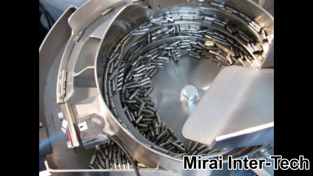 Piezo Vibratory Feeder for Family of Cylindrical Parts - YouTube