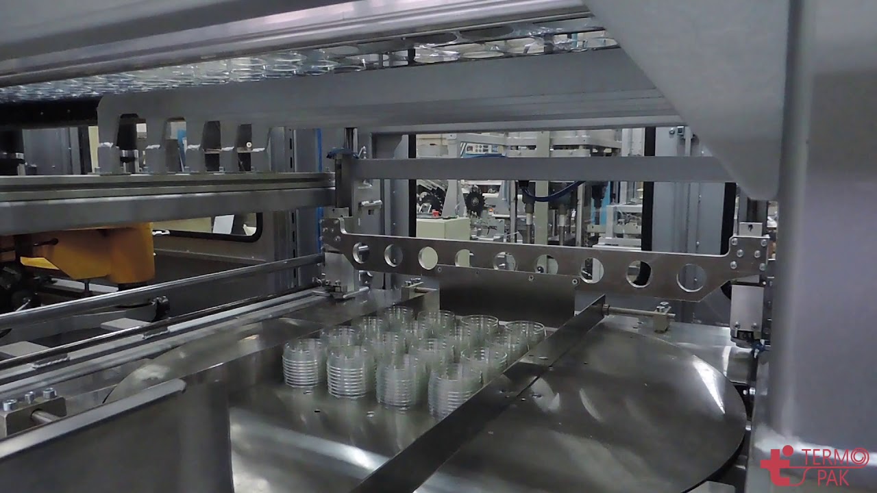 Forming and integrated cutting. Thermoforming of PET lids. - YouTube