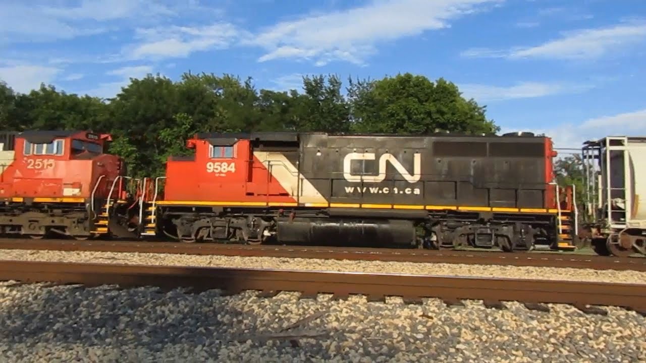 CN 9584 GP40-2L trails on Canadian National Freight Train - YouTube
