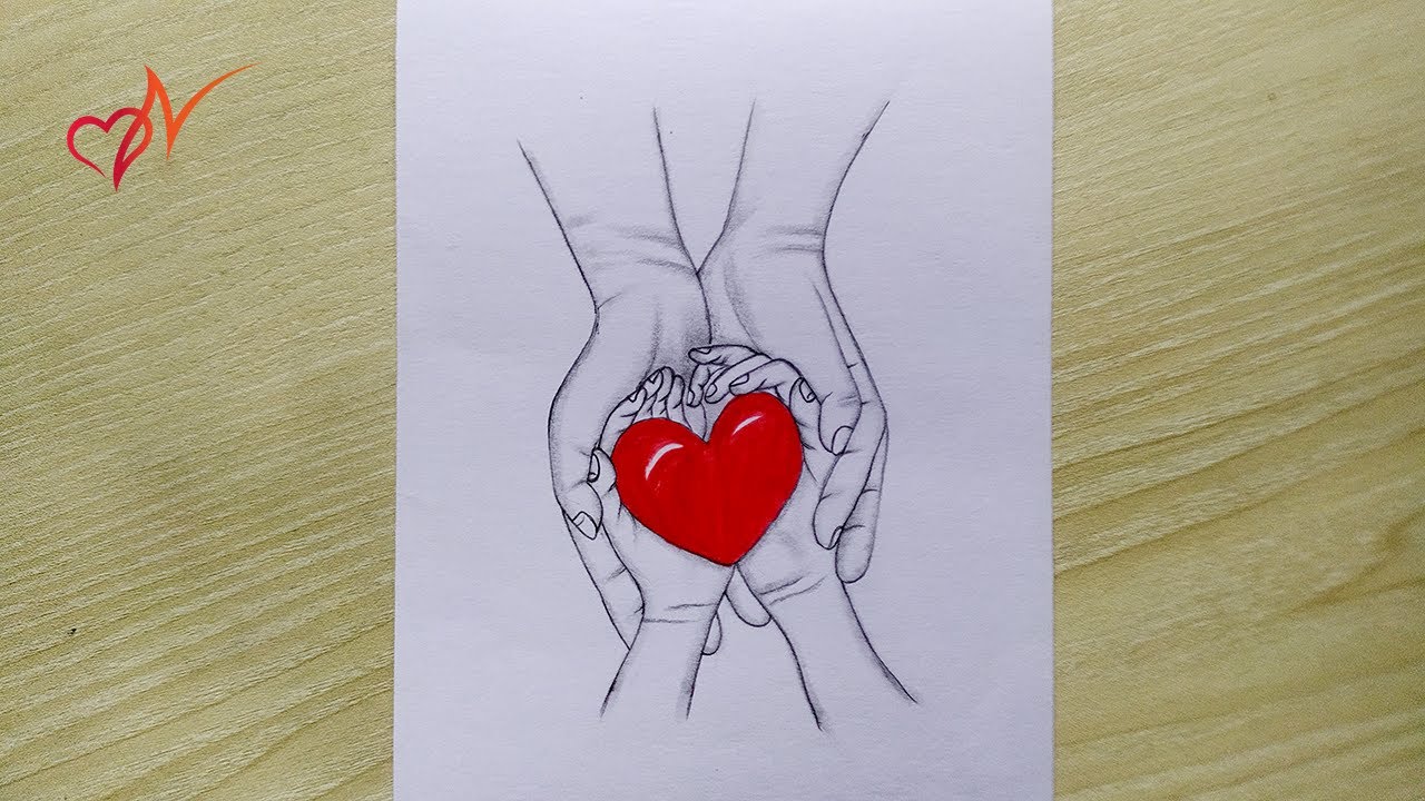 Two Hands Holding A Heart Drawing