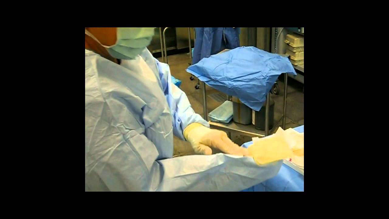 Changing Contaminated Glove and using Sterile Sleeve - YouTube