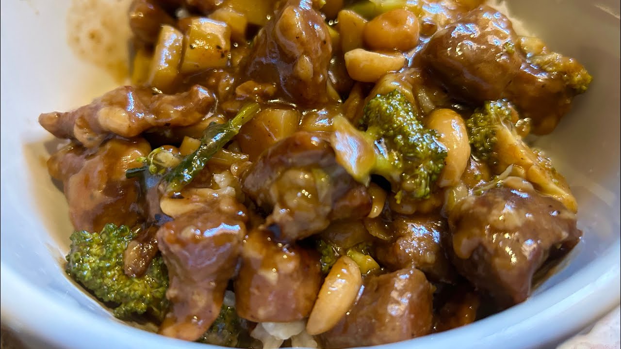 Beef broccoli with rice and beef-tips with onion an mushroom gravy ...