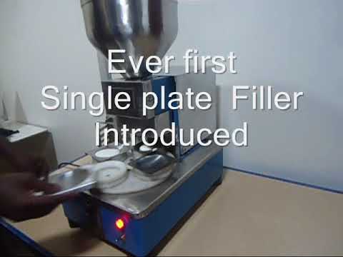 Idly batter filling machine - YouTube
