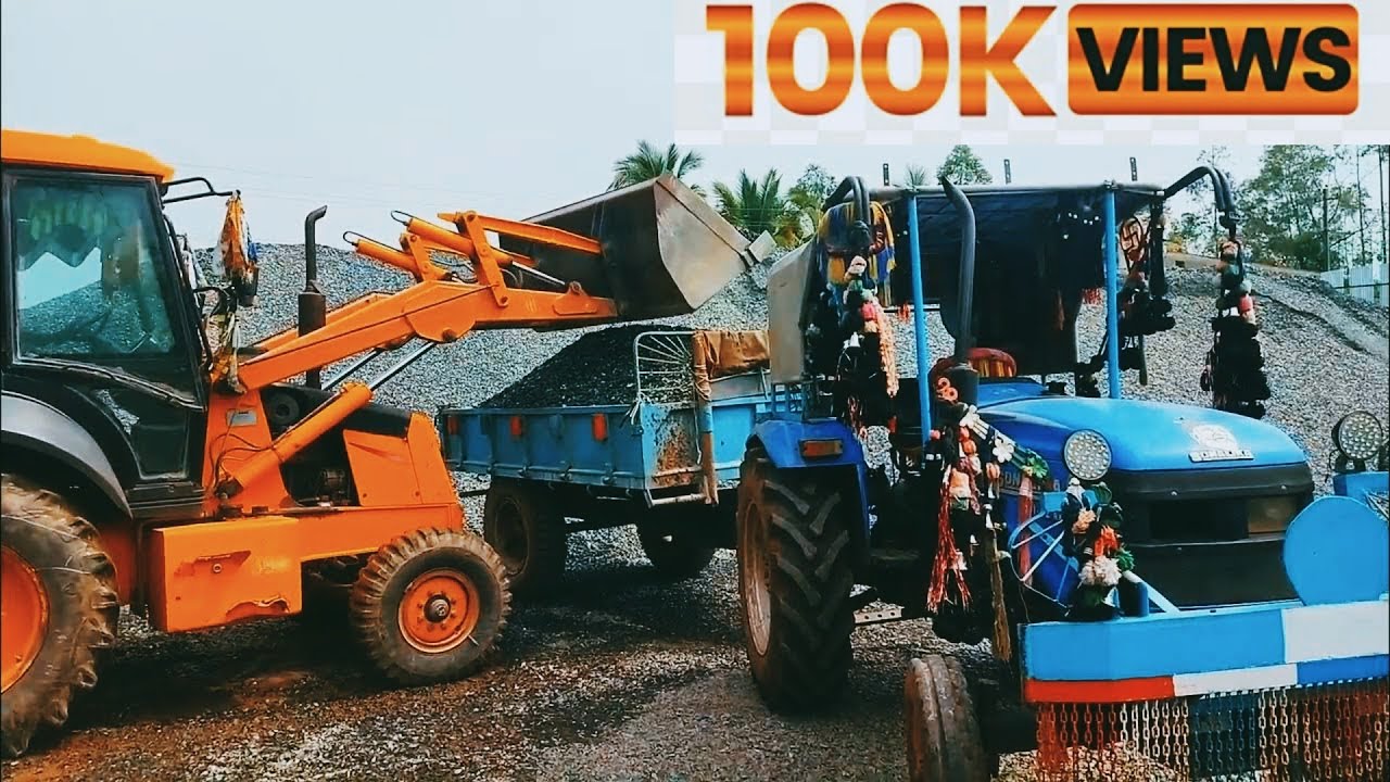 JCB 3XD Machine Loading Stone With Front Loader in Tractor Trolley ...
