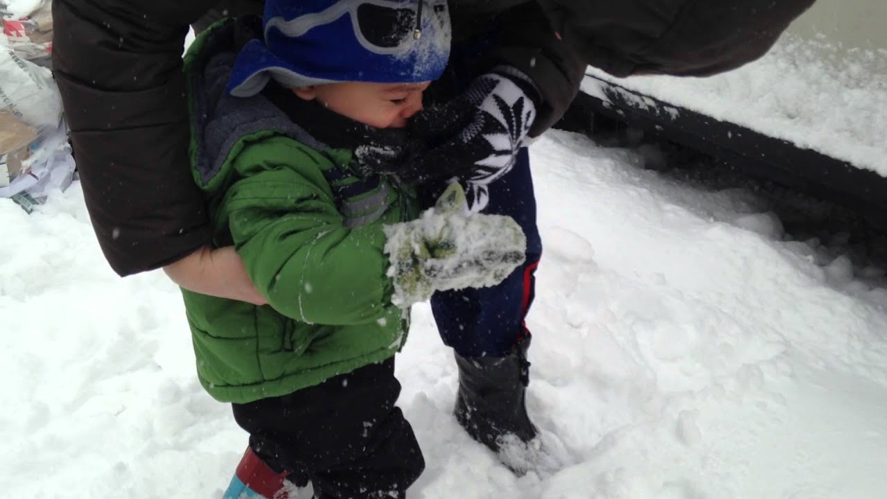 Cute baby falling face into the snow - YouTube
