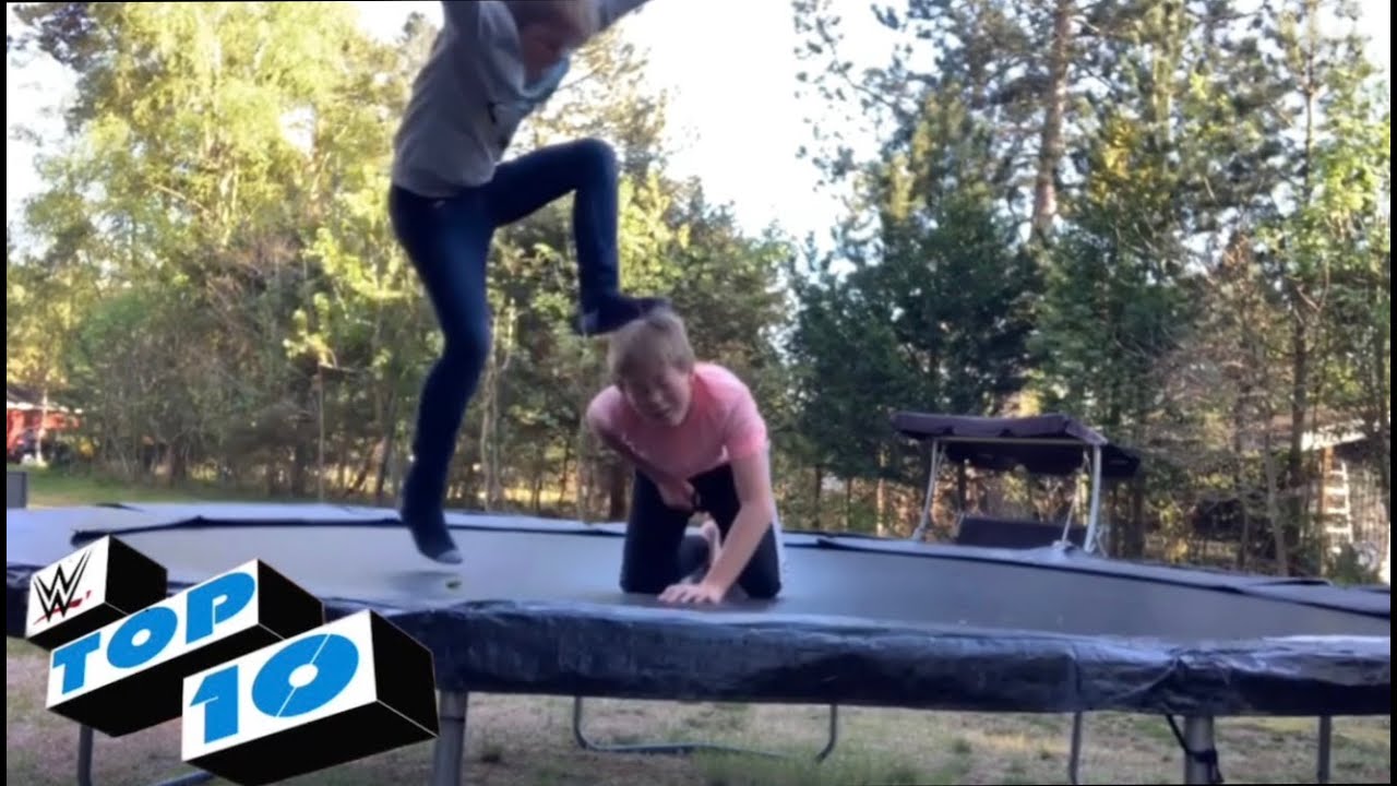 TOP 10 WWE MOVES AT THE TRAMPOLINE - YouTube