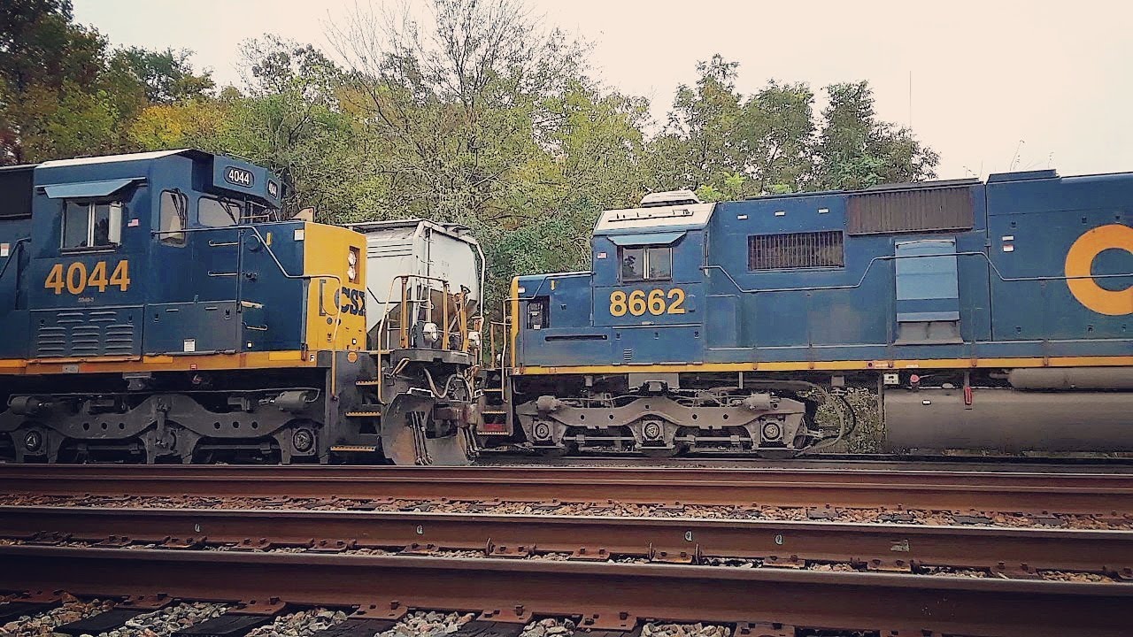 CSXT F713 & Y105 Ex-CR SD50-3 #8662 lots of Notch 8 drilling cars at Milan yard - YouTube