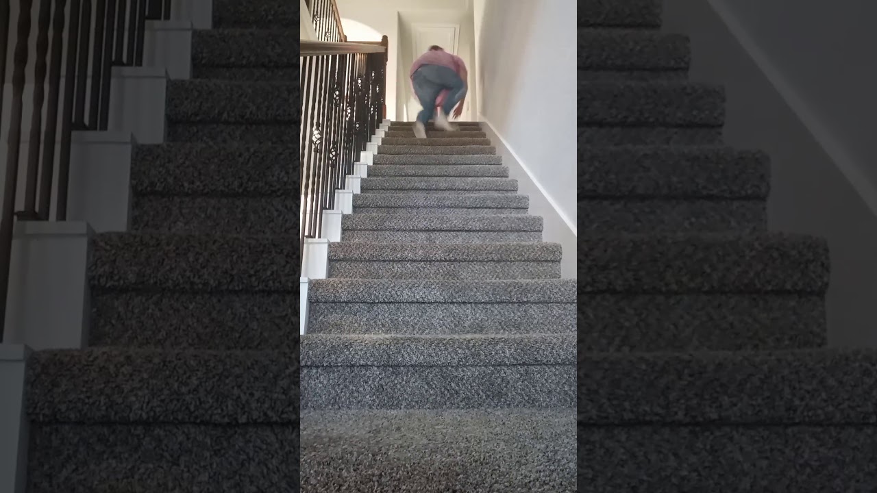 Zoe sliding down stairs in reverse ( More like sliding back up. ) - YouTube