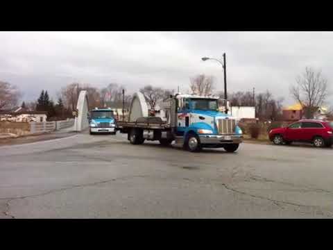 Tow trucks lead funeral procession - YouTube