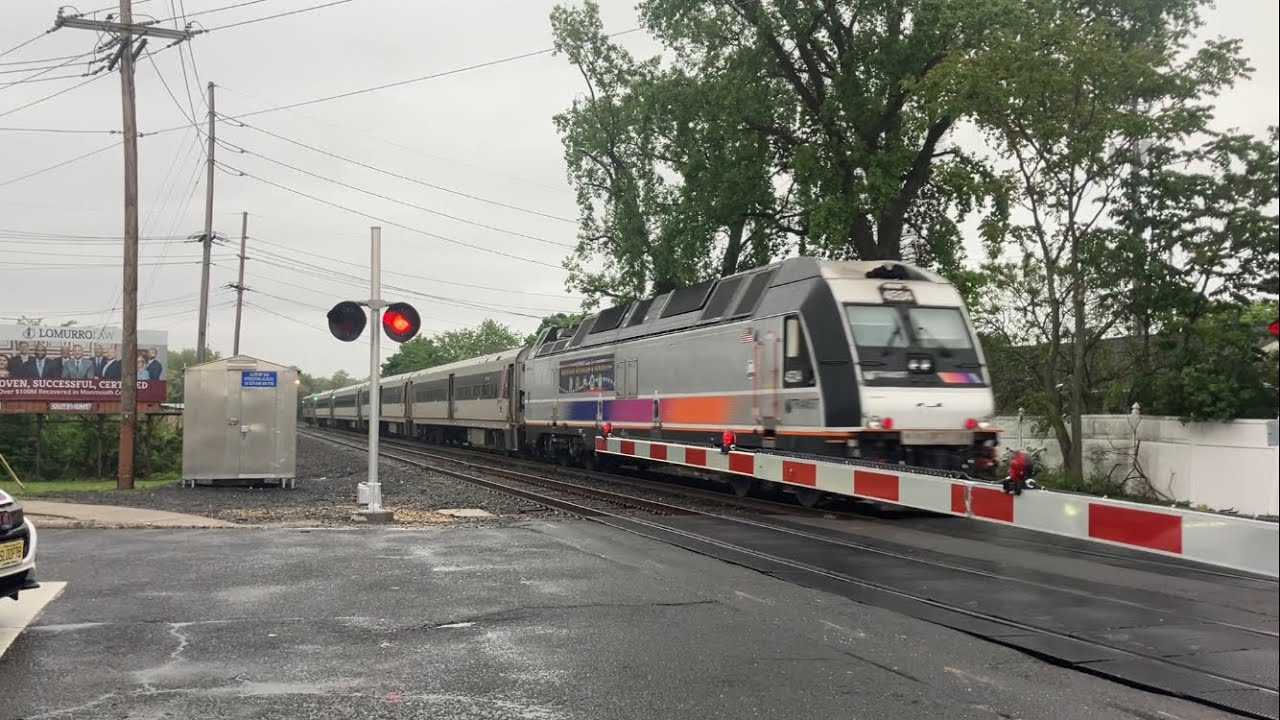 Two NJCL Trains at Stockton Lake Blvd Grade Crossing in the Rain - YouTube