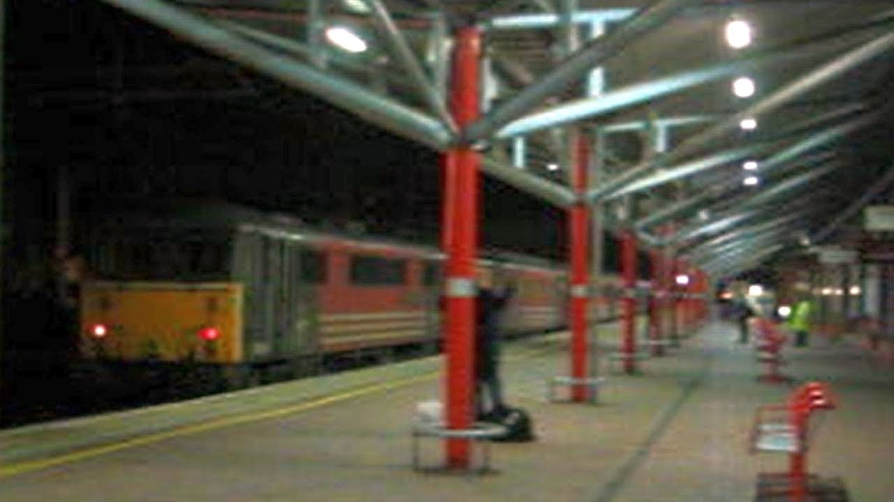 UK: Rugby, Virgin Trains Class 87 electric loco departs on a London ...
