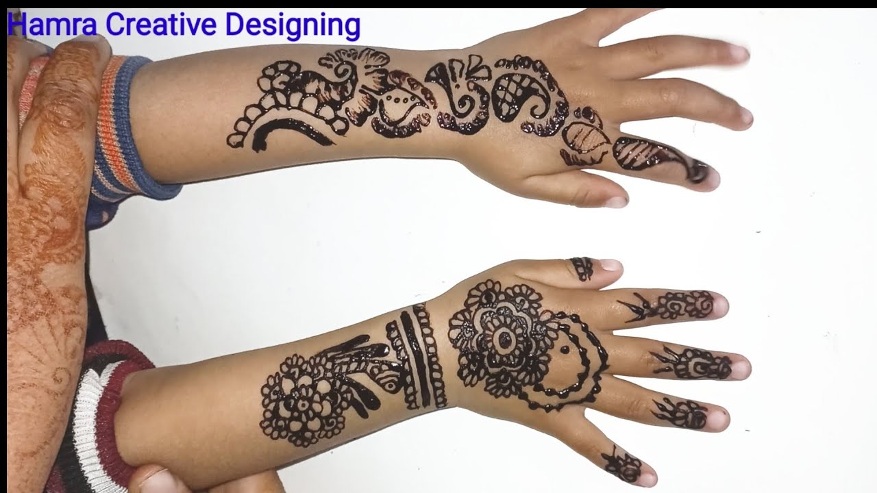 A layer style cone mehandi design 2022 on little cute baby girl hand by ...
