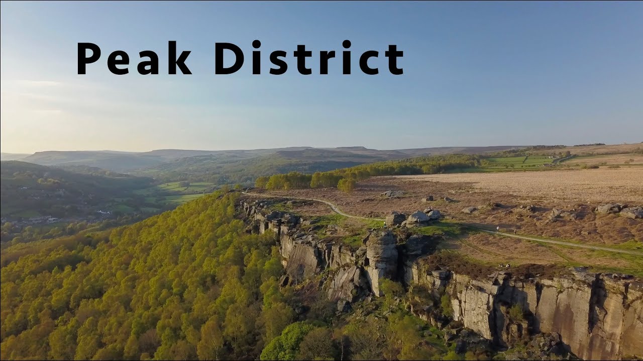 Aerial film of the Peak District including many popular sites and some ...