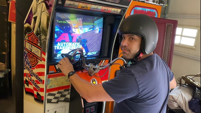 Man Playing Arcade Car Game