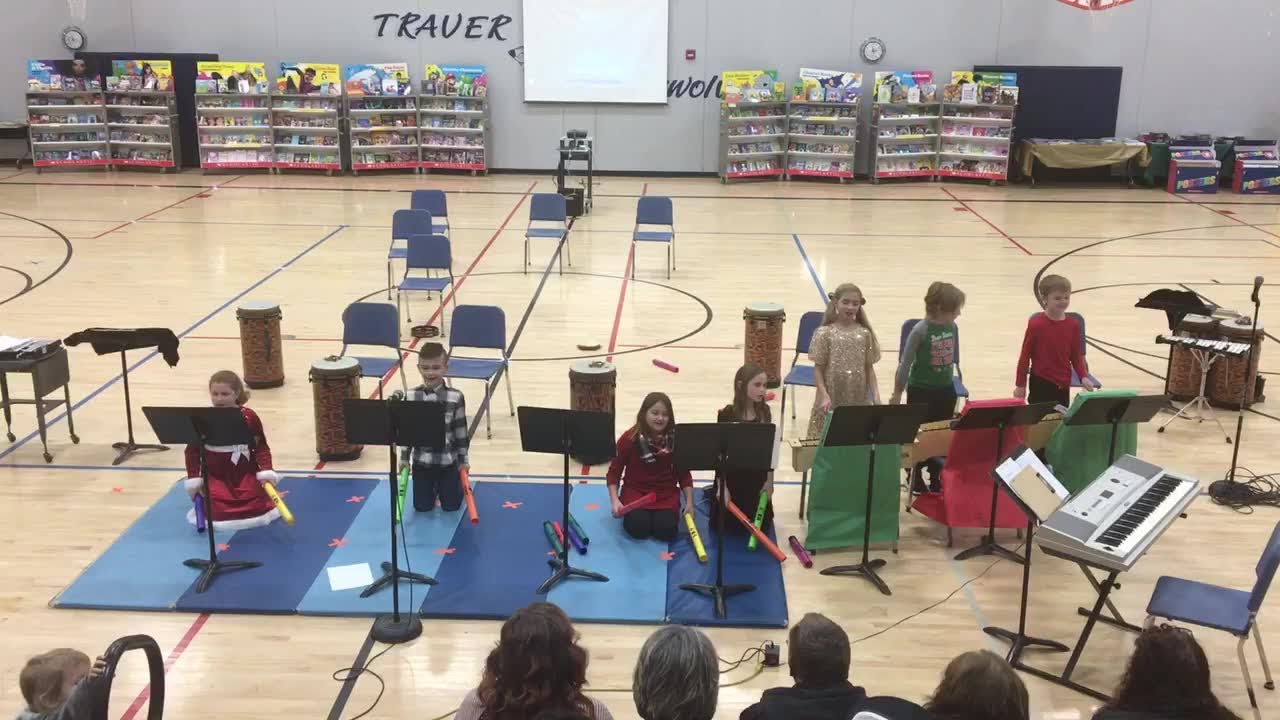Traver School third-graders perform “Jingle Bells” at the school’s Dec ...