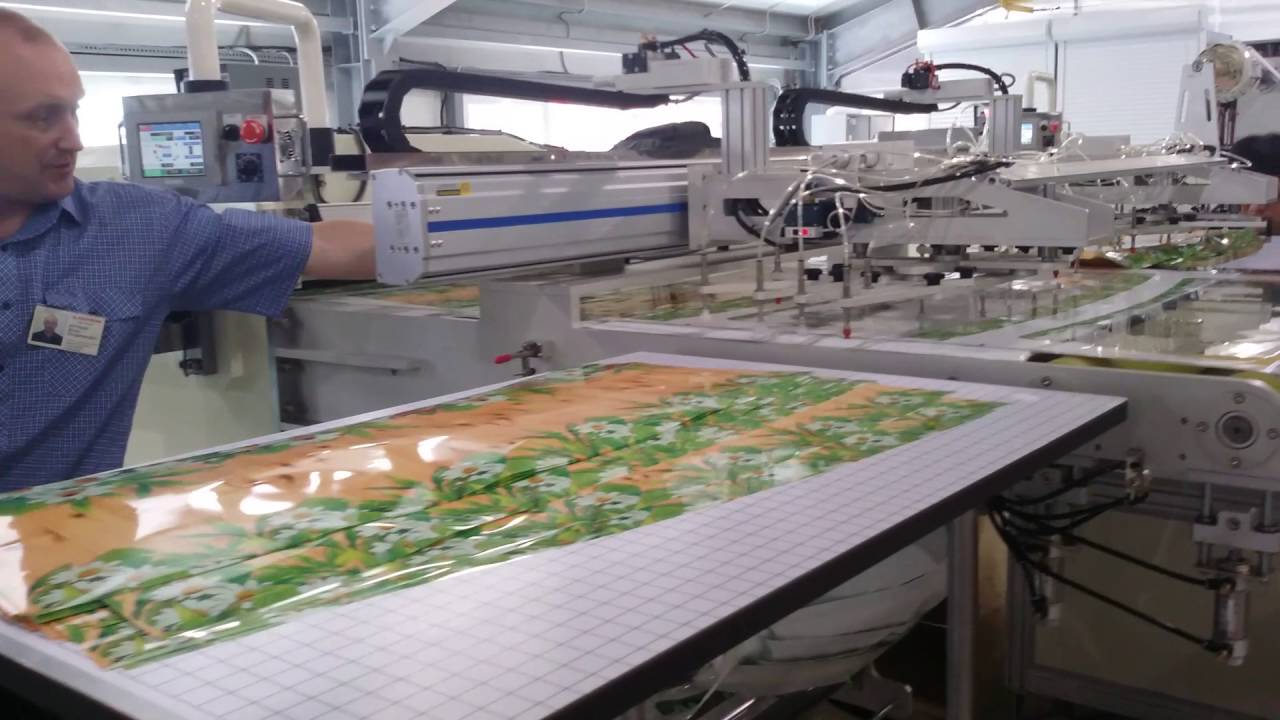 Automatic film cutting machine with robot stackers made in Korea / TOP ...