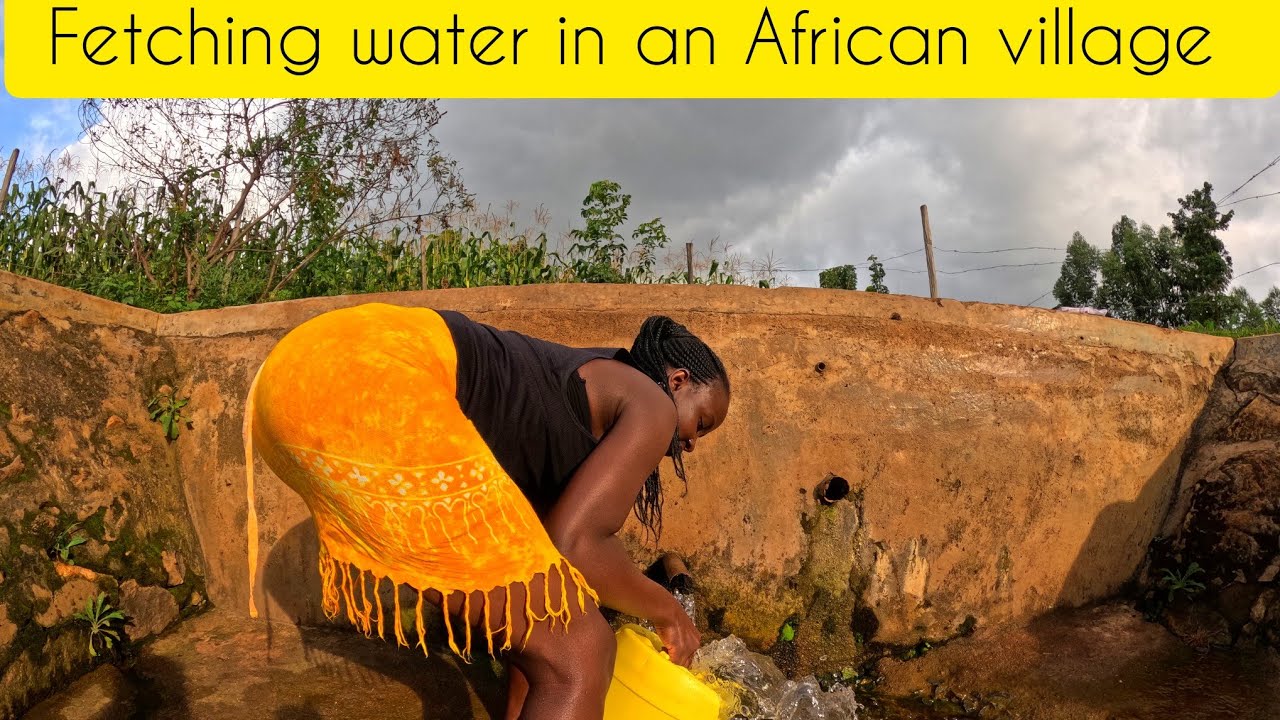African Village Life // Fetching water at a Spring in an African ...