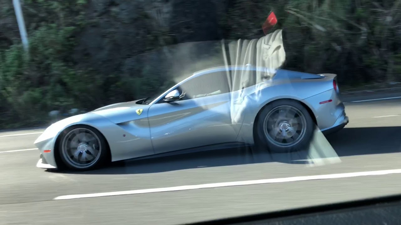 Ferrari F12 racing in traffic - YouTube