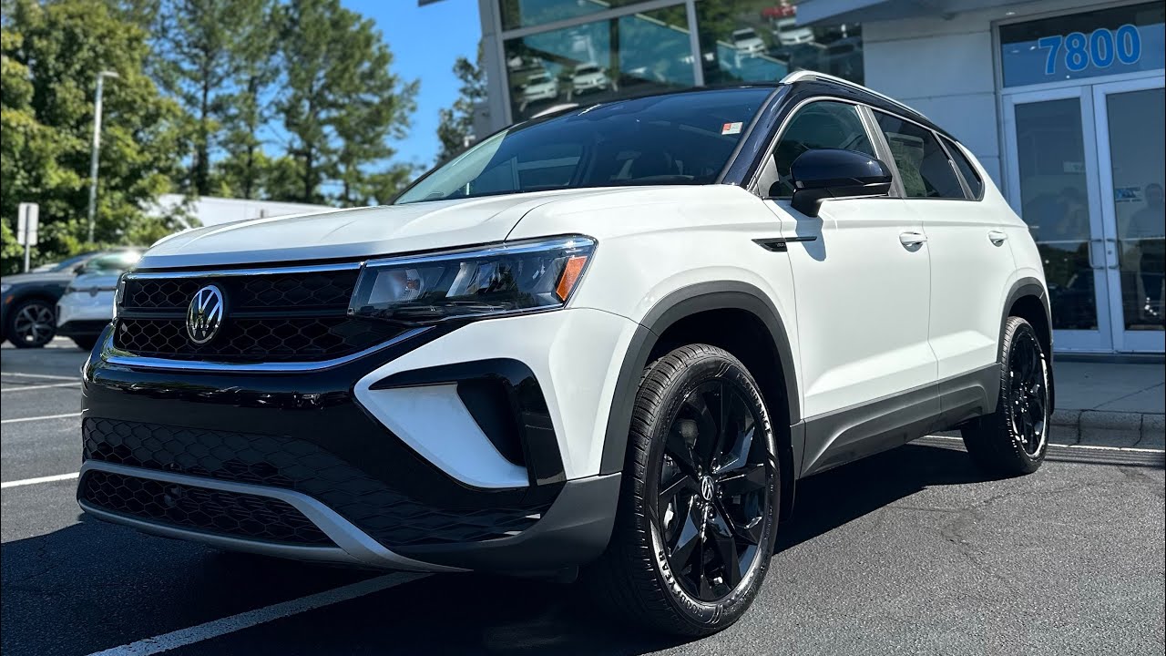 2023 Volkswagen Taos SE white with black roof walk around video - YouTube