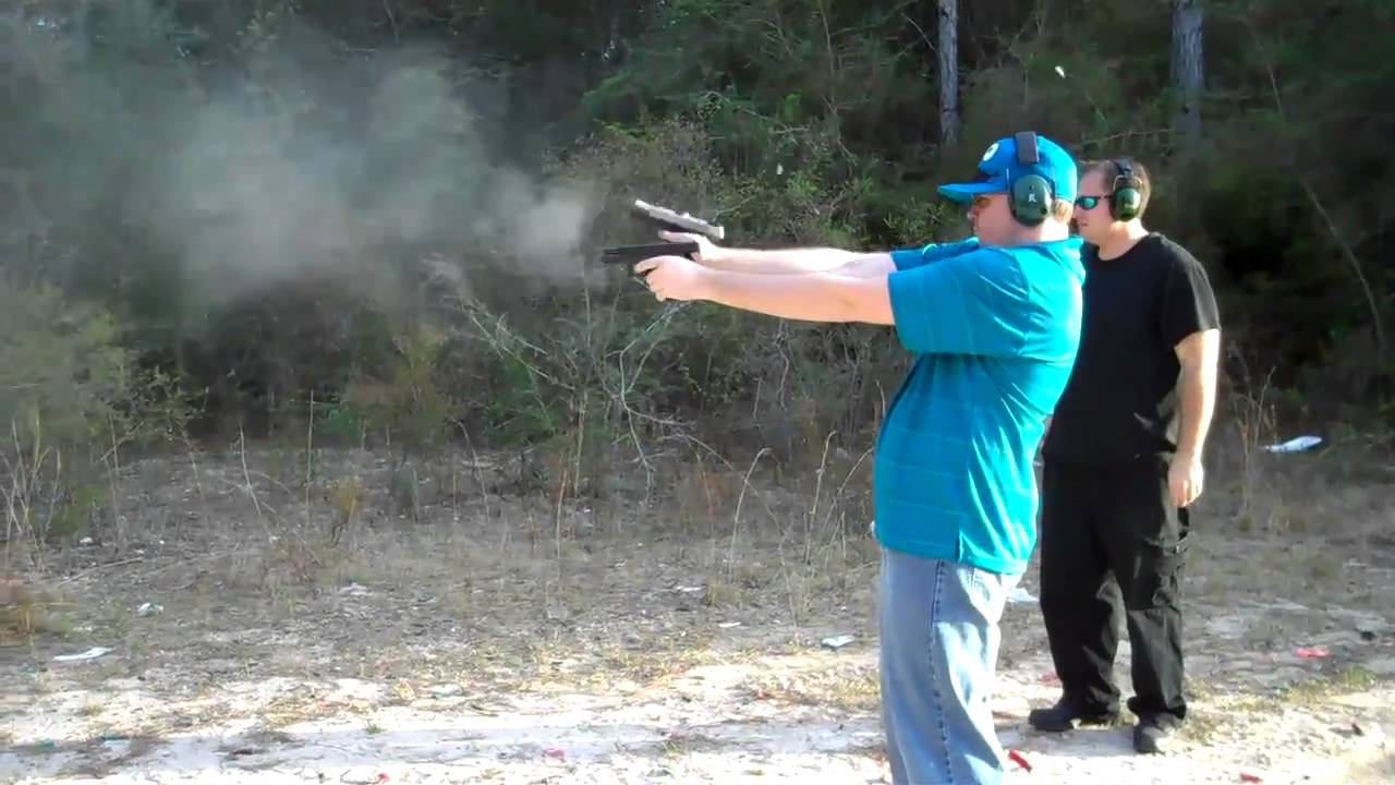 duel wielding glock and ruger - YouTube