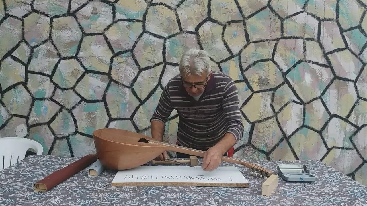 Πως να διορθώσουμε τόξο στο μπουζούκι - YouTube
