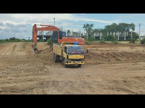 truck loading and unloading material - YouTube