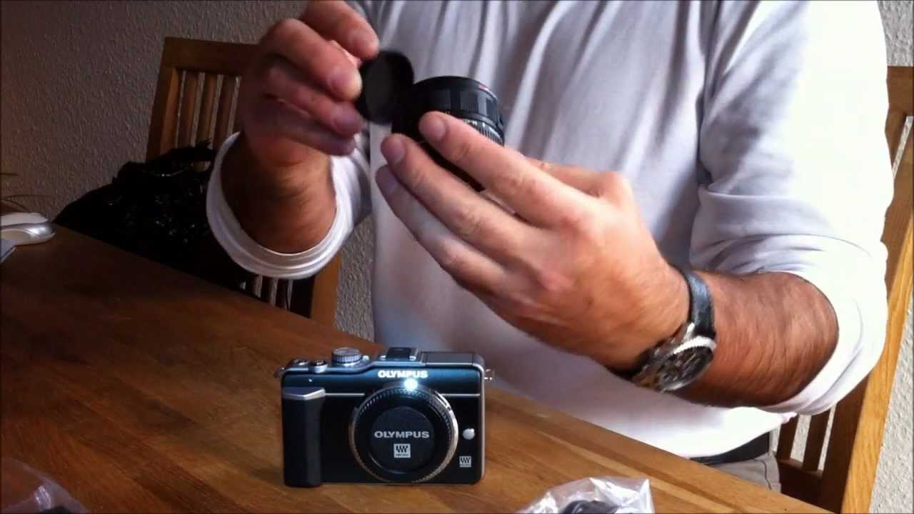 Olympus Pen E-PL1 Unboxing Part 1 - YouTube