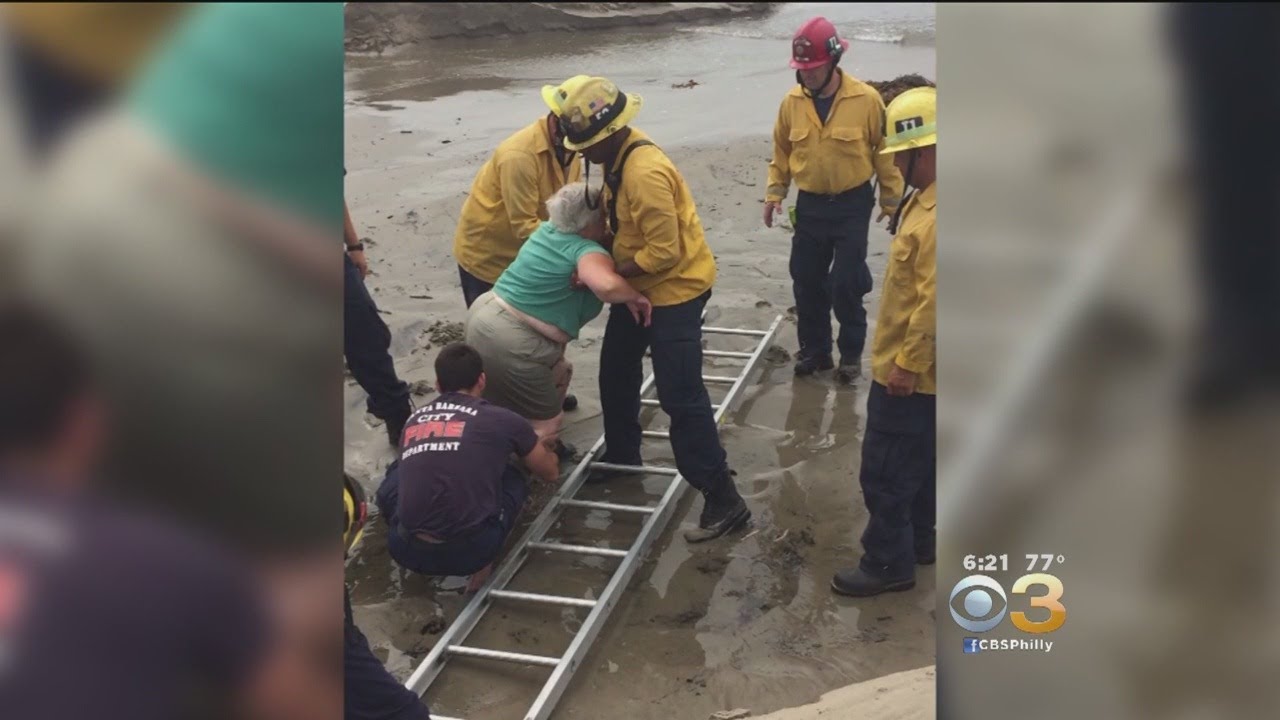 Firefighters Rescue Elderly Woman Stuck In Wet Sand - YouTube