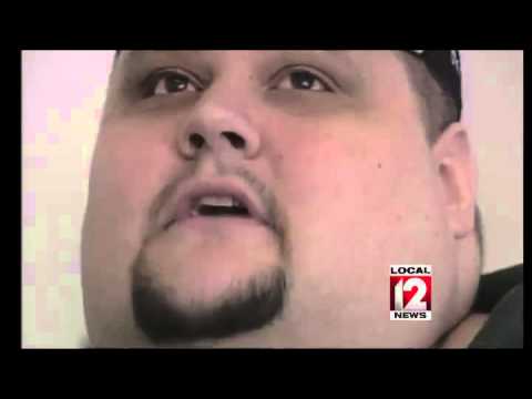 1,200-pound man to be moved by crane - YouTube