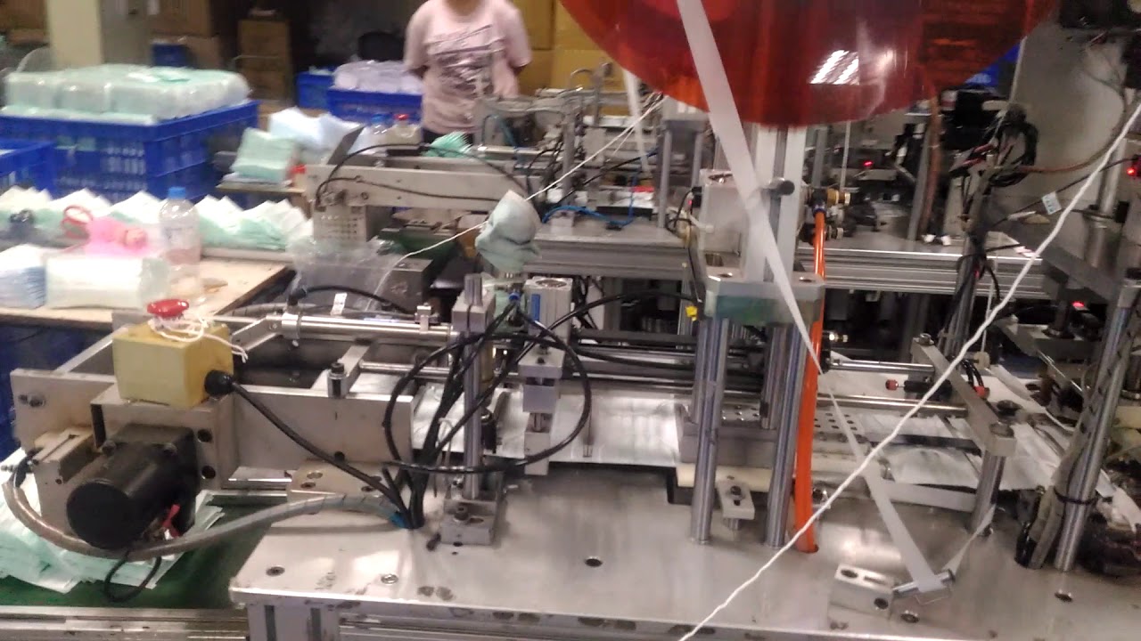 Fully automated inside earloop mask making machine carrymask - YouTube