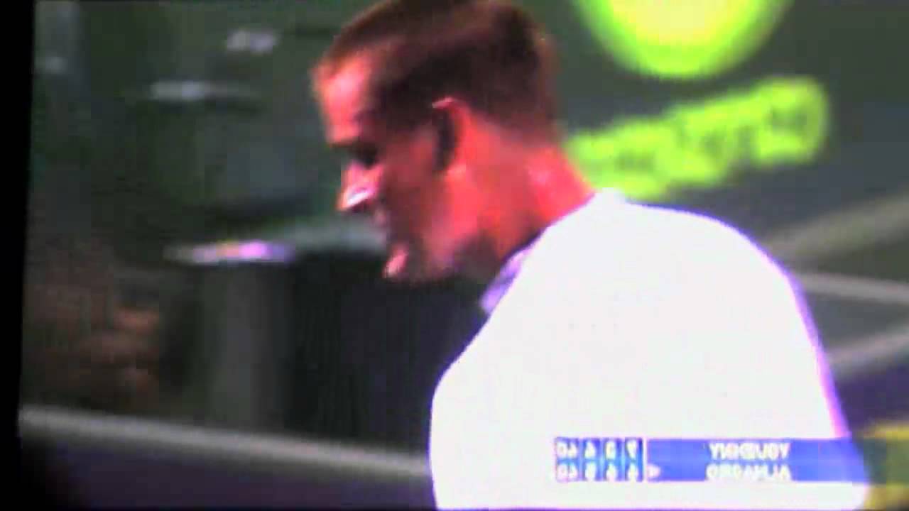 Guy hits himself in the face with tennis racket - YouTube