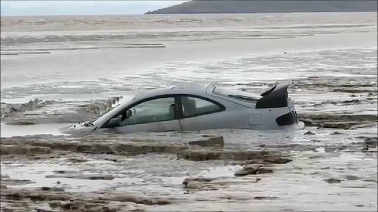 Stranded sports car on Berrow beach - YouTube