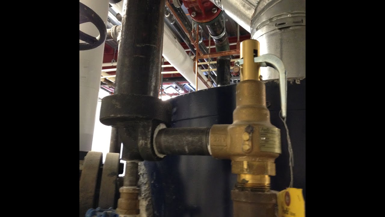 Testing a steam pop safety valve - YouTube