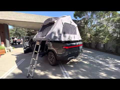 Rivian R1T Overland Edition with bed tent flyby electric truck overview ...