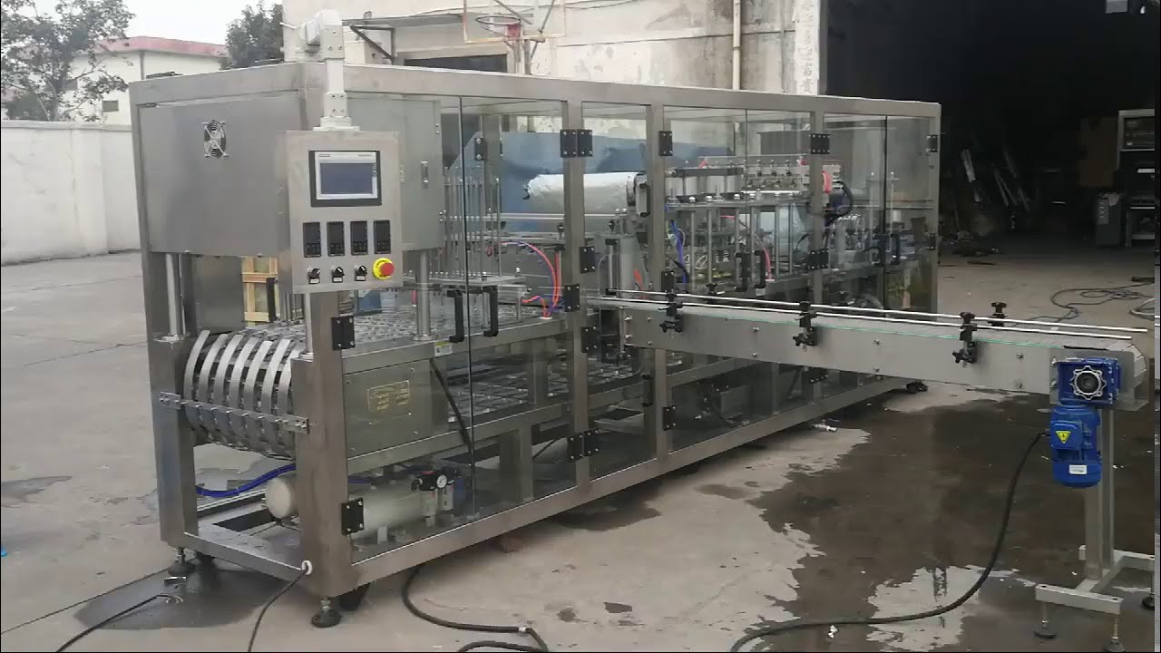 Automatic water cup filling and sealing machine - YouTube