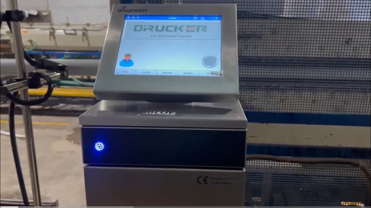 Precision in Action: Drucker Blue Ink Printer Seamlessly Printing on ...